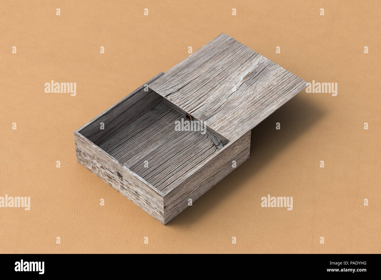 Empty square vintage wooden box with opened sliding lid on beige ...