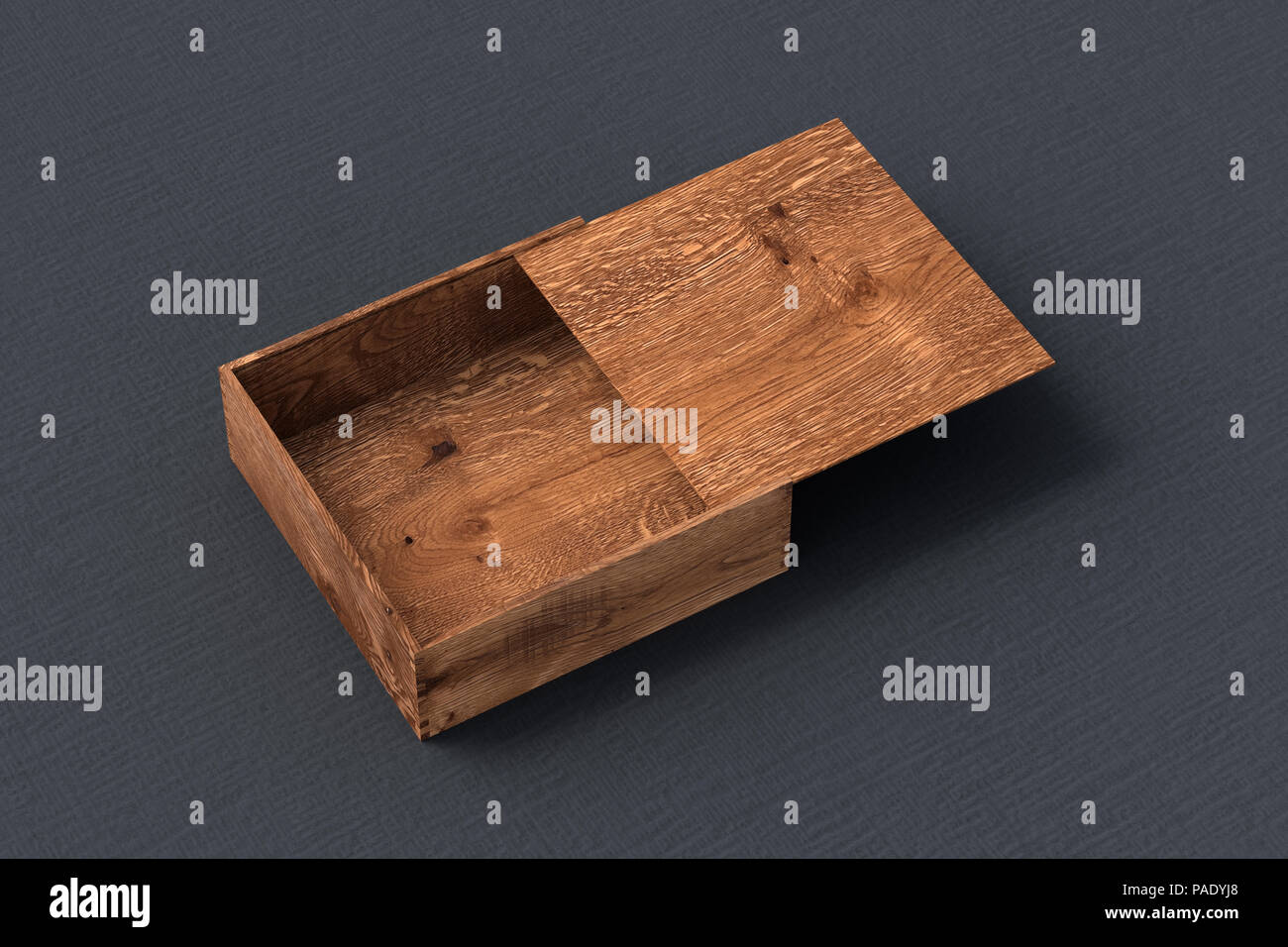 Empty dark wooden square box with opened sliding lid on gray background ...