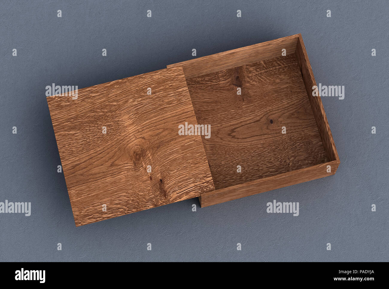 Empty dark wooden square box with opened sliding lid on gray background ...