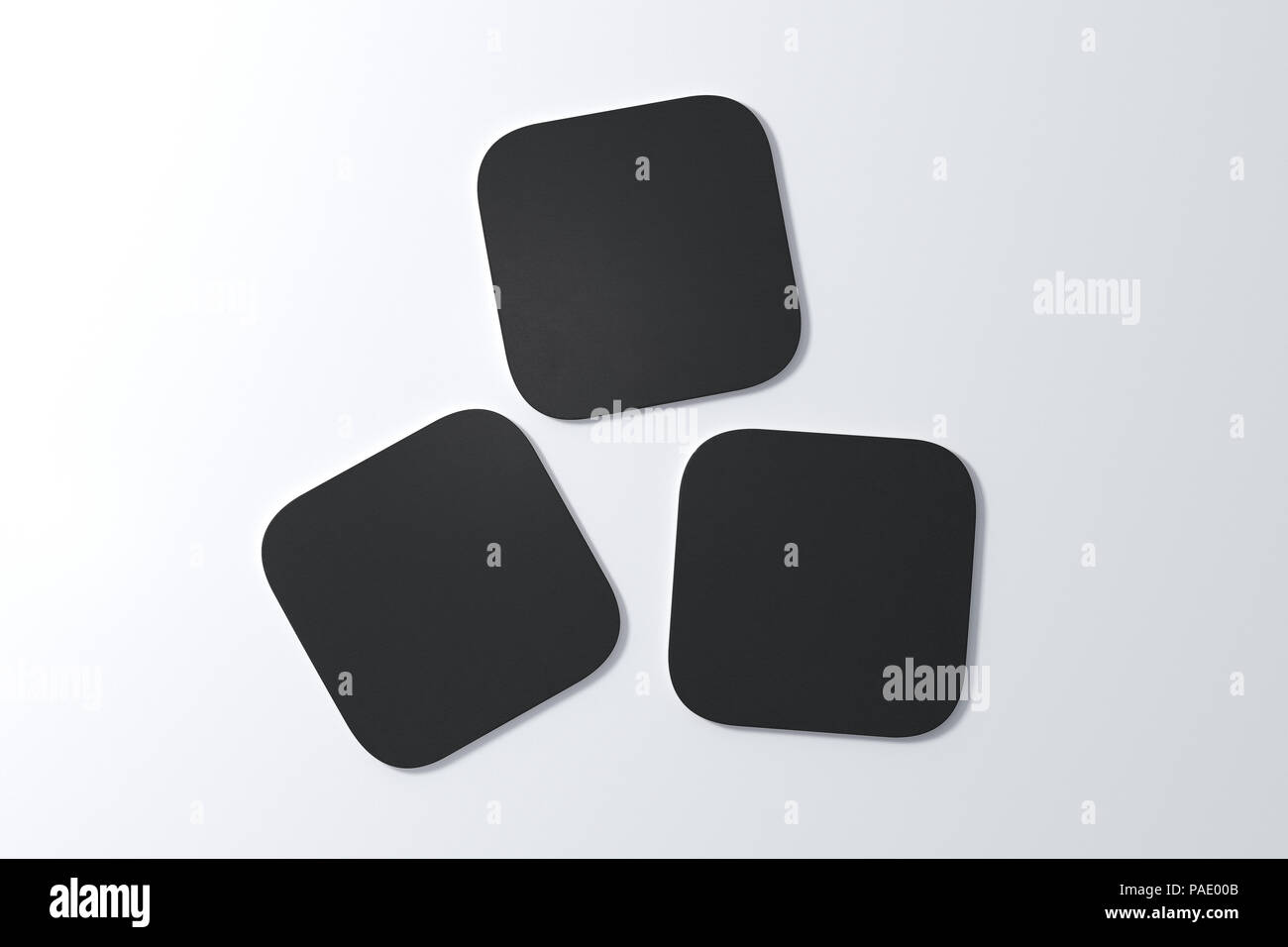 Three square black coasters on white background. 3d illustration Stock ...