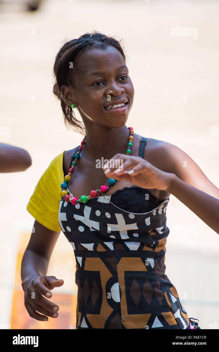 ANGOLA, LUANDA - MARCH 4, 2013: Portrait of a Angolan sympathic woman ...
