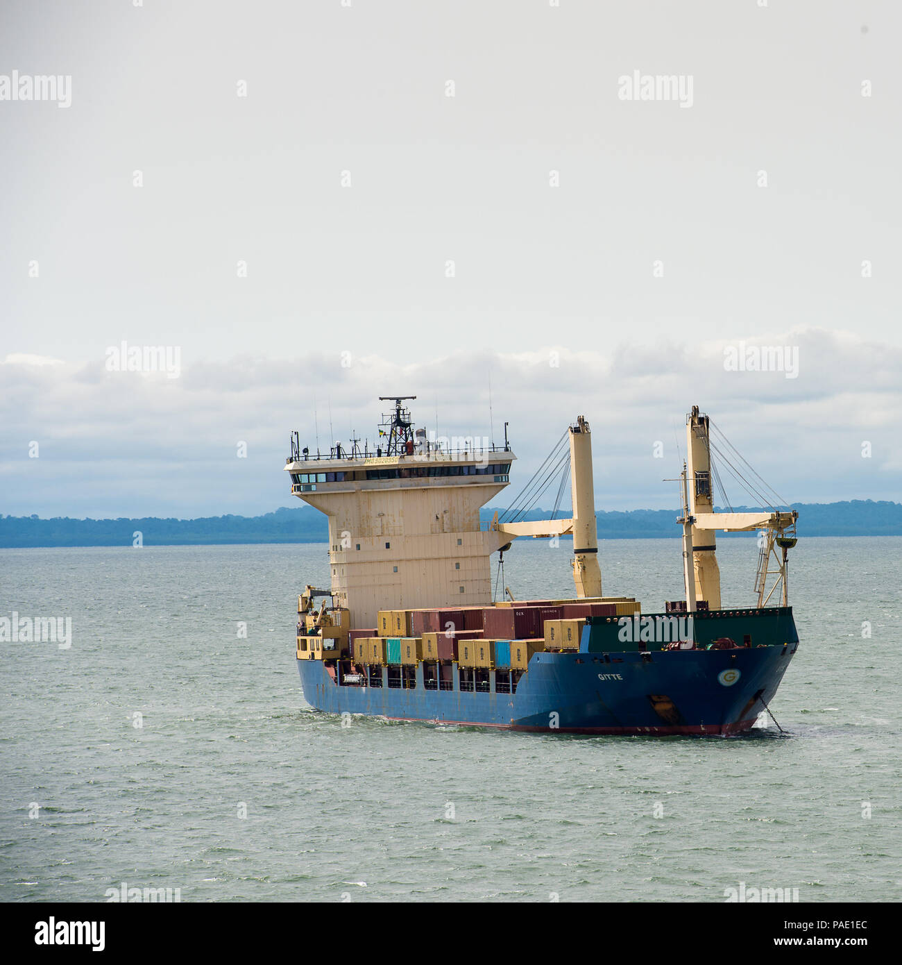 LIBREVILLE, GABON - MAR 6, 2013: Cargo ship near the port of Libreville ...