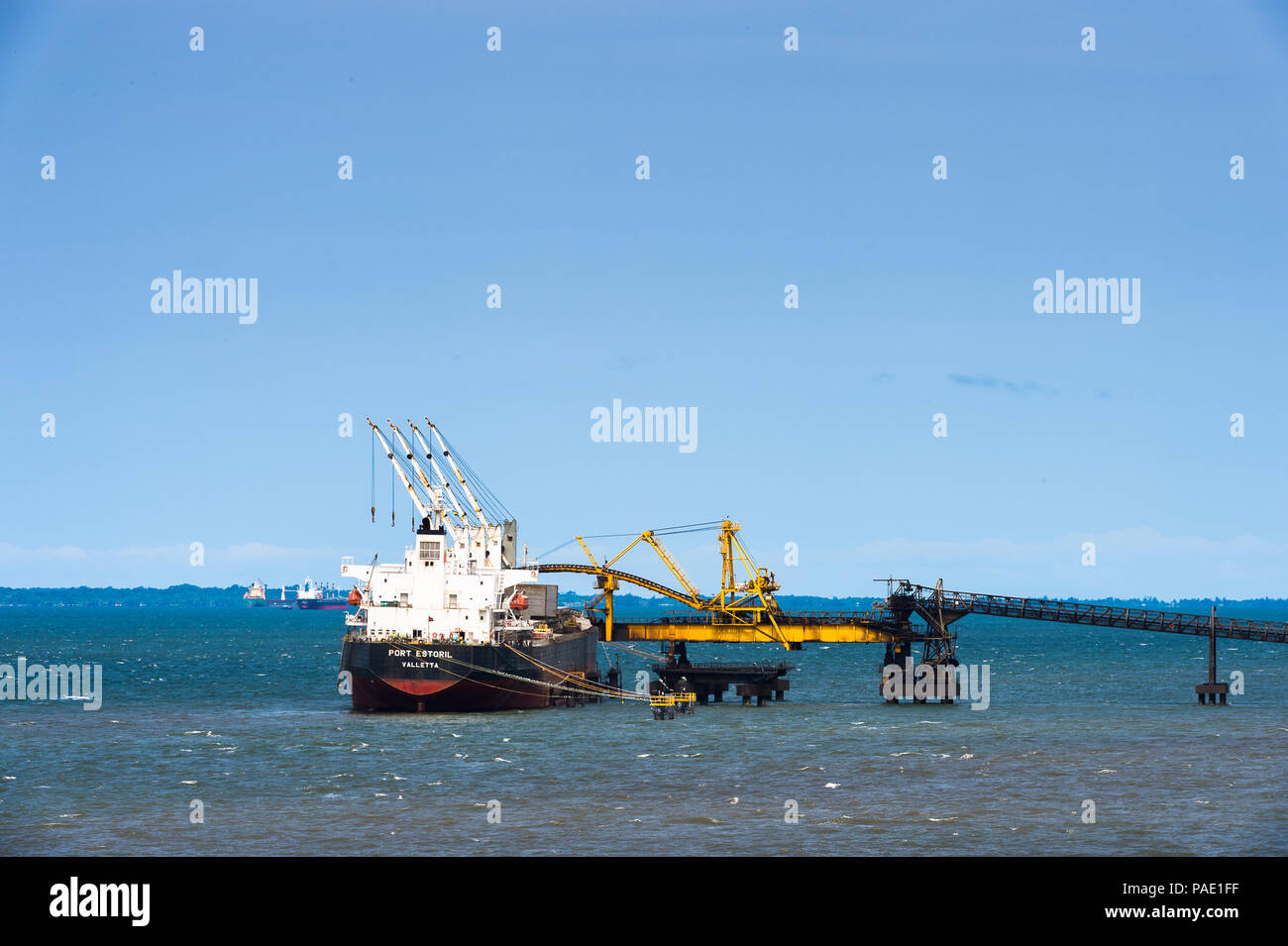 LIBREVILLE, GABON - MAR 6, 2013: Cargo ship near the port of Libreville ...
