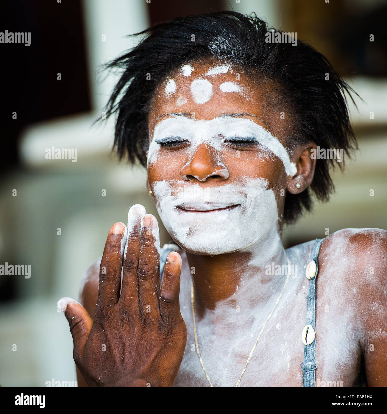GABON - MARCH 6, 2013: Unidentified Gabonese girl with the white paint ...