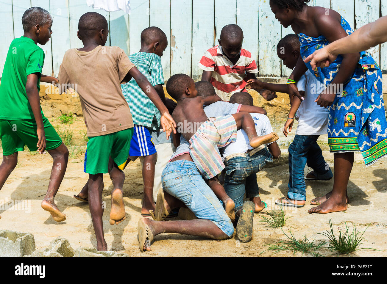 LIBREVILLE, GABON - MAR 6, 2013: Unidentified Gabonese woman tries to ...