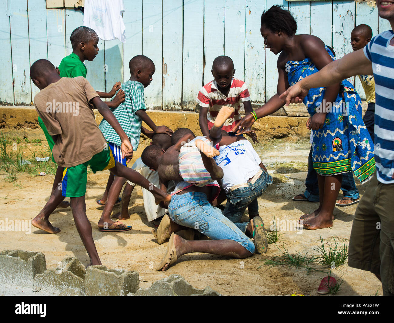 LIBREVILLE, GABON - MAR 6, 2013: Unidentified Gabonese woman tries to ...