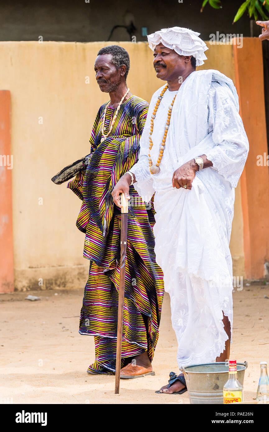 LOME, TOGO - MAR 9, 2013: Unidentified Togolese men in traditional ...