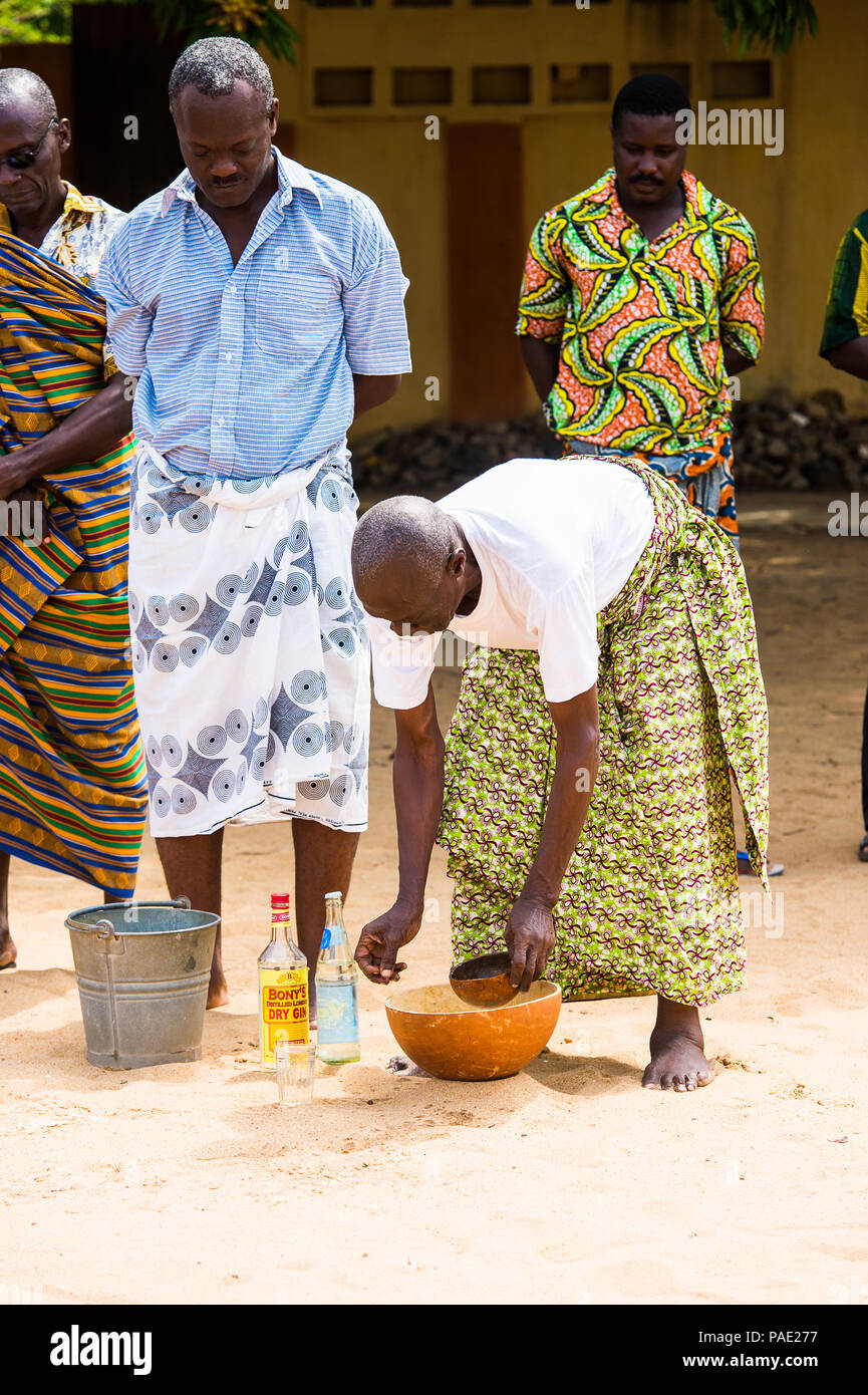 LOME, TOGO - MAR 9, 2013: Unidentified Togolese men in traditional ...