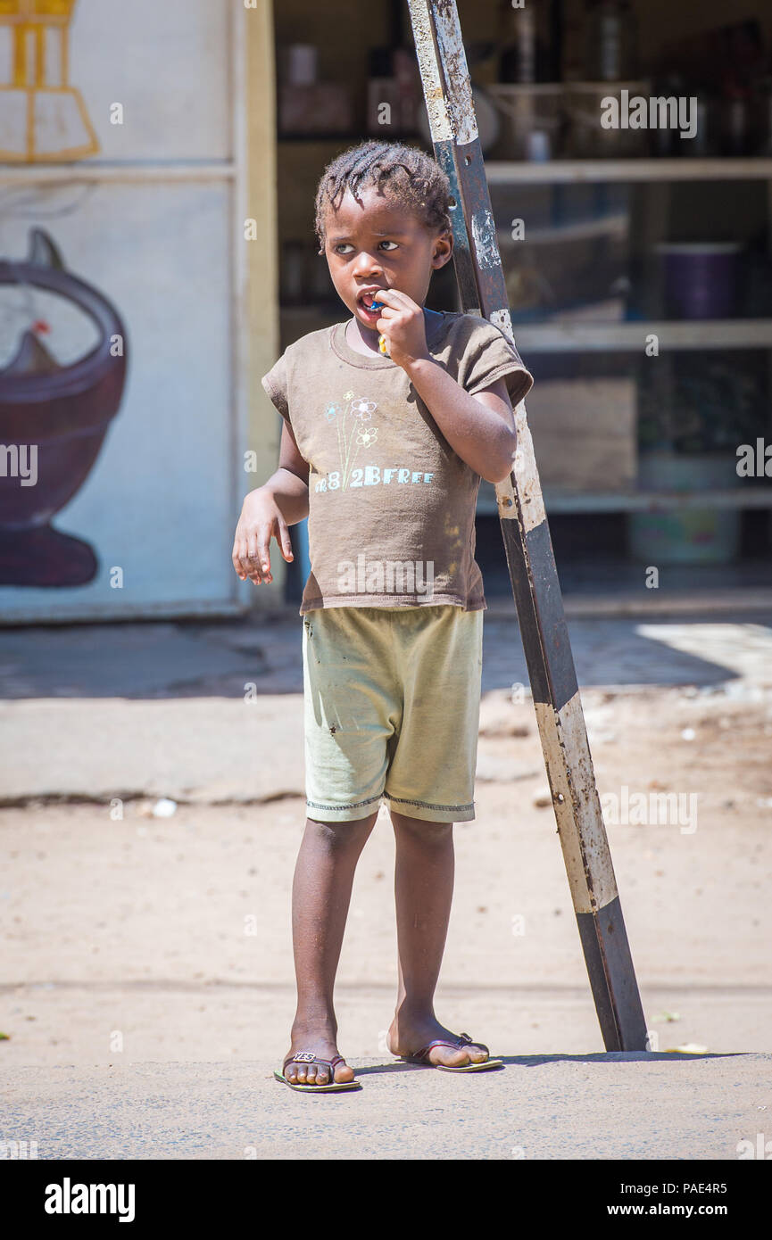 BANJUL, GAMBIA - MAR 14, 2013: Unidentified Gambian little boy plays in ...