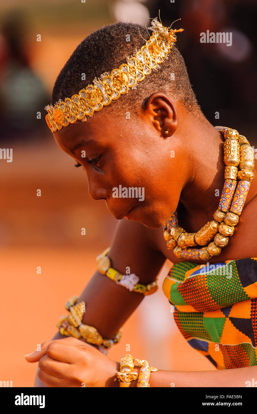 GHANA - MARCH 3, 2012: Portrait of a Ghanaian girl in national colors ...