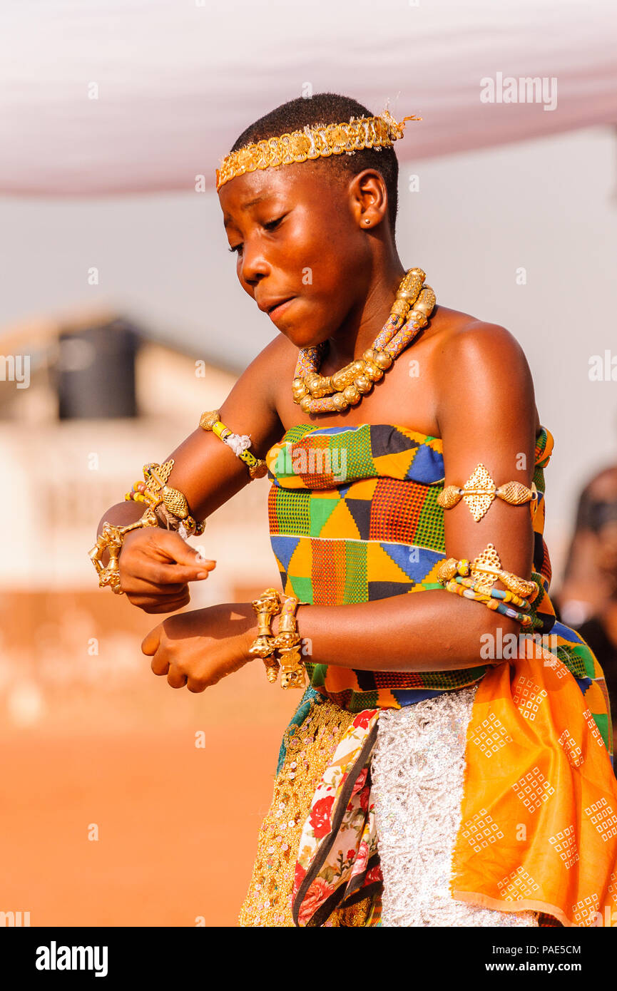 GHANA - MARCH 3, 2012: Ghanaian girl in national colors clothes dances ...