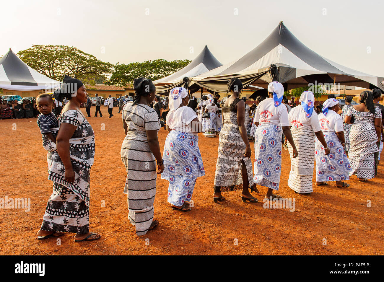 ACCRA, GHANA - MARCH 4, 2012: Unidentified Ghanaian people walk to see ...