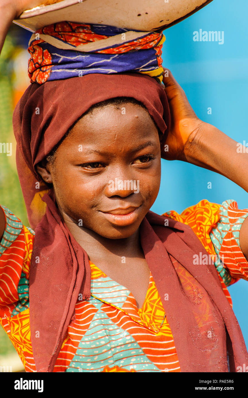 ACCRA, GHANA - MARCH 4, 2012: Unidentified Ghanaian woman trasports ...