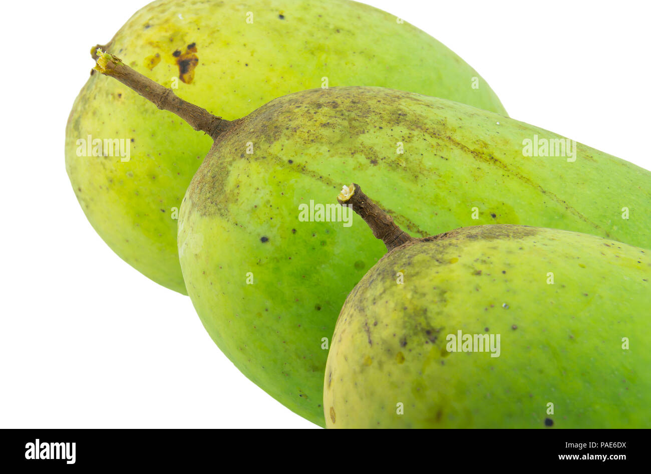 Yellow and green mango fruit isolated on white Stock Photo - Alamy