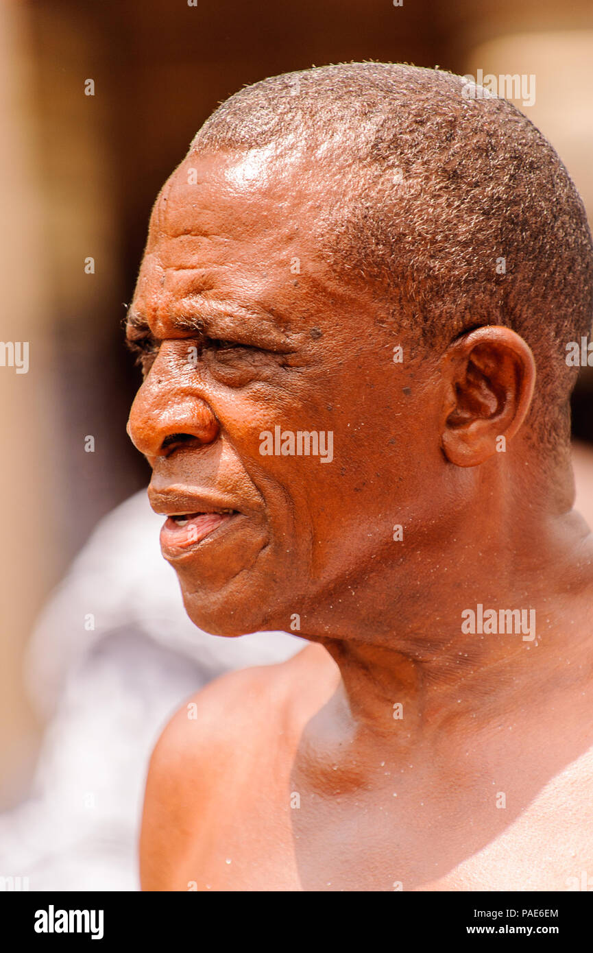 ACCRA, GHANA - MARCH 4, 2012: Unidentified Ghanaian man watches the ...