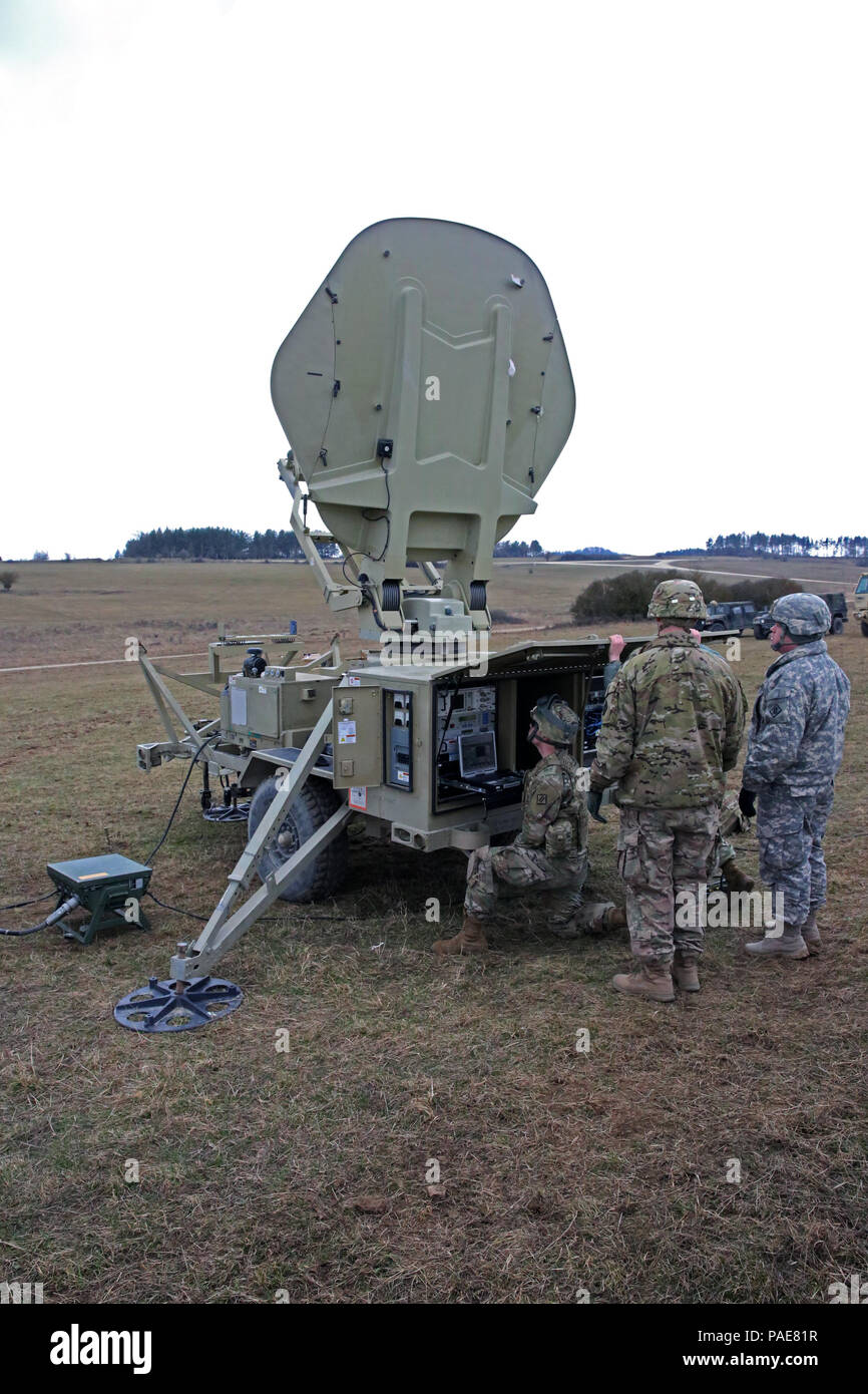 Soldiers from the 44th Expeditionary Signal Battalion, 2nd Signal Brigade, work to establish a ...