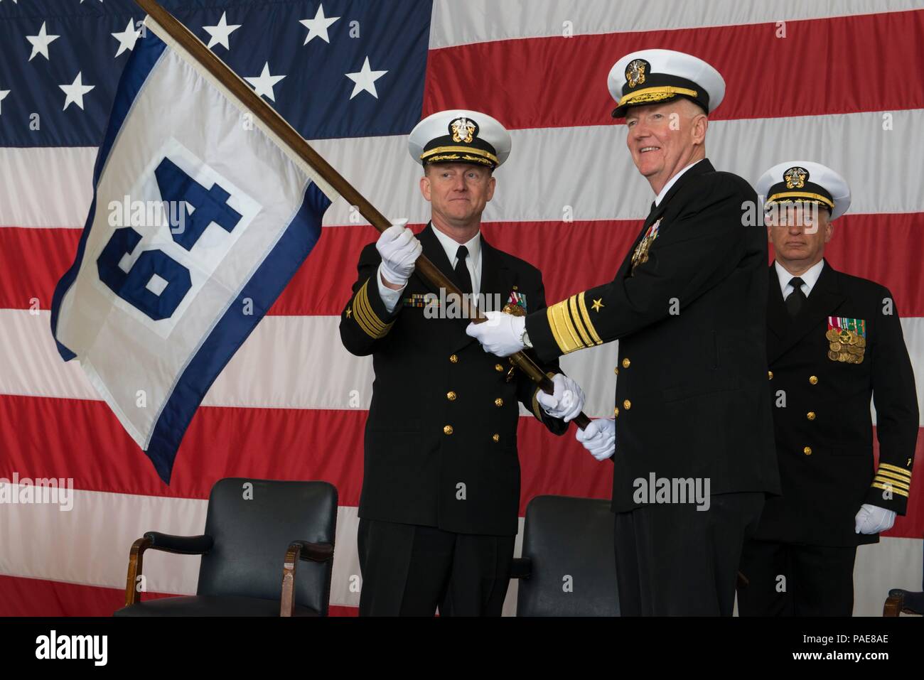 The Commander of U.S. 6th Fleet presents the guidon of Commander, Task ...