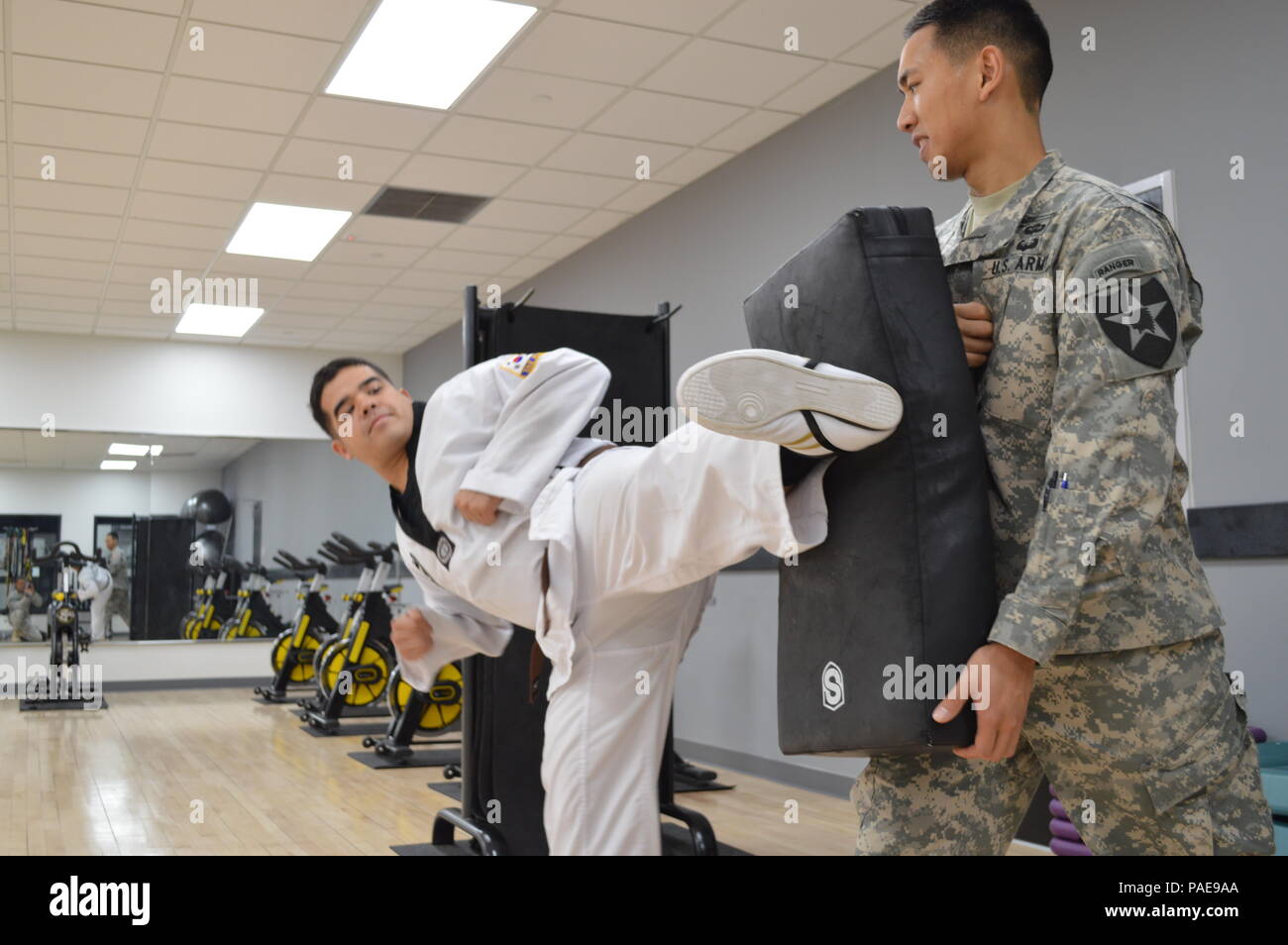 Capt. Ronald Medina (left), sustainment officer, 2nd Battalion, 12th ...