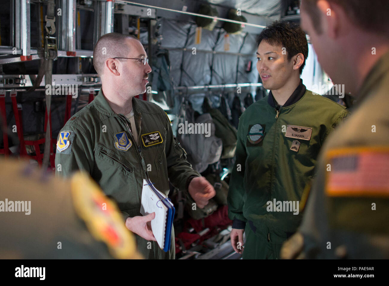(Left to right) U.S. Air Force Maj. Adam Boyd, 374th Operations Group C ...