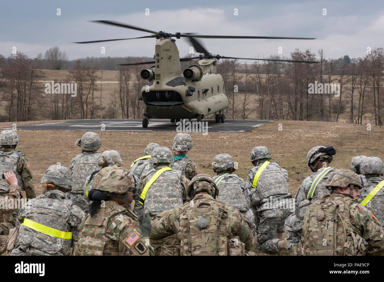 Soldiers from the 44th Expeditionary Signal Battalion, 2nd Signal Brigade rest after a ...