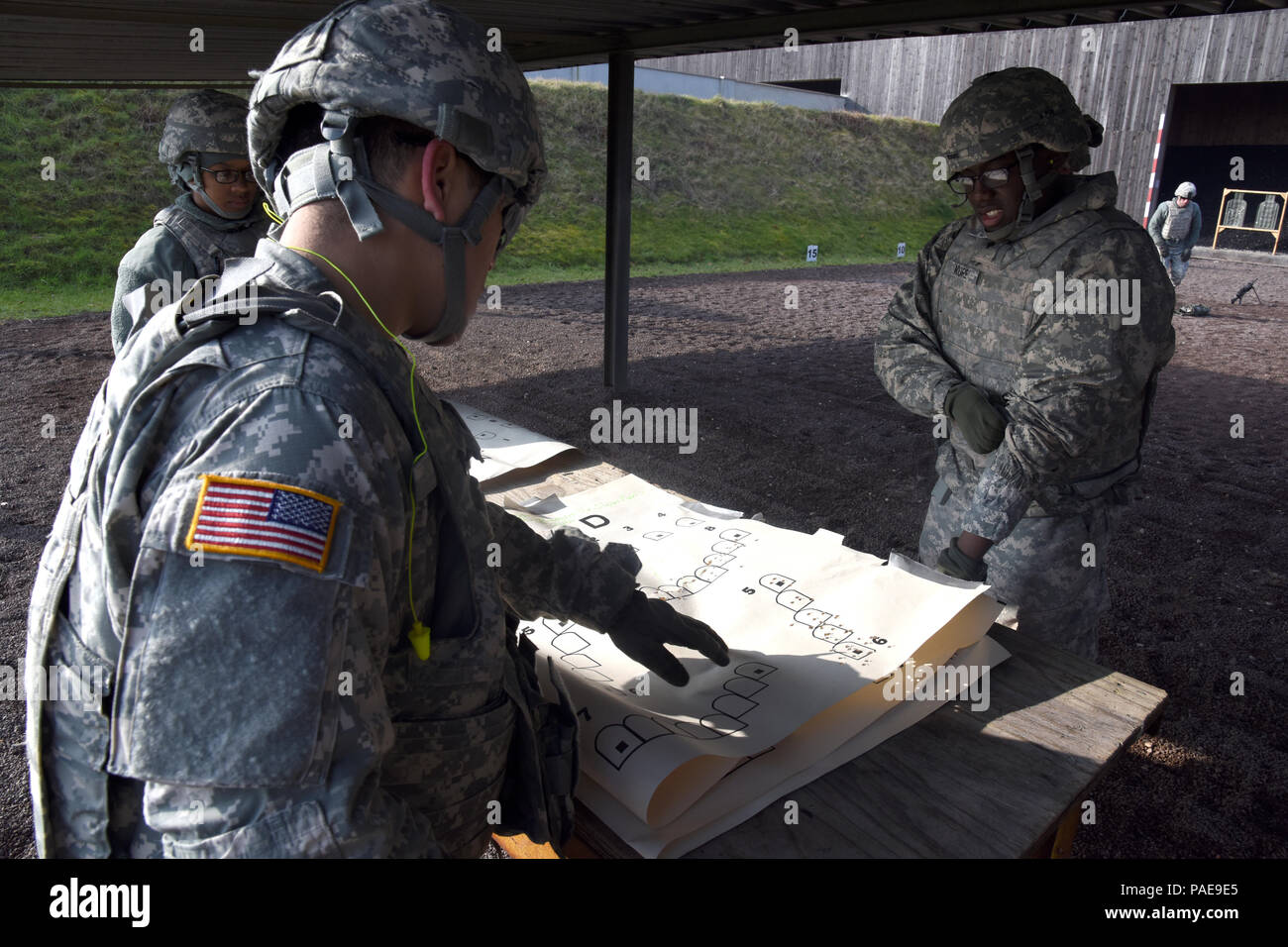 Spc. Moore (right) and other soldiers from 66th Military Intelligence ...