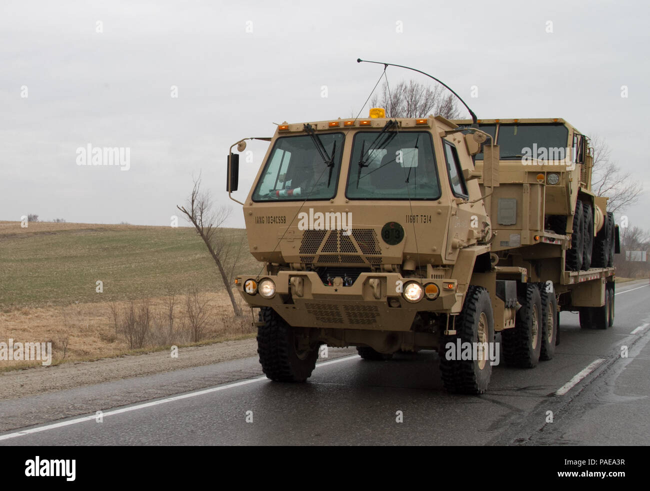 Soldiers from the 1168th Transportation Company transport an FMTV ...