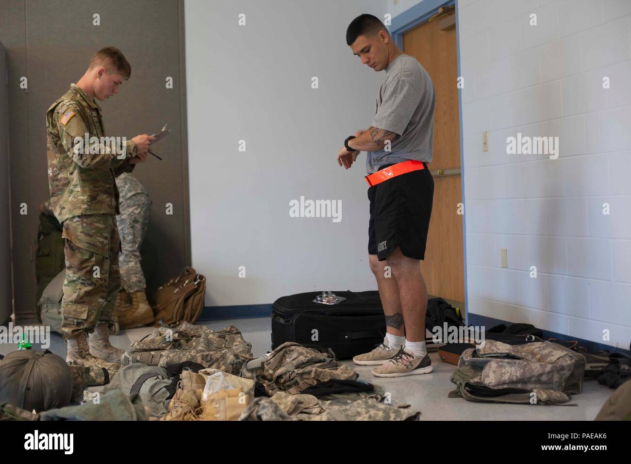 U.S. Army Soldier gets his gear inspected as part of inprocessing ...