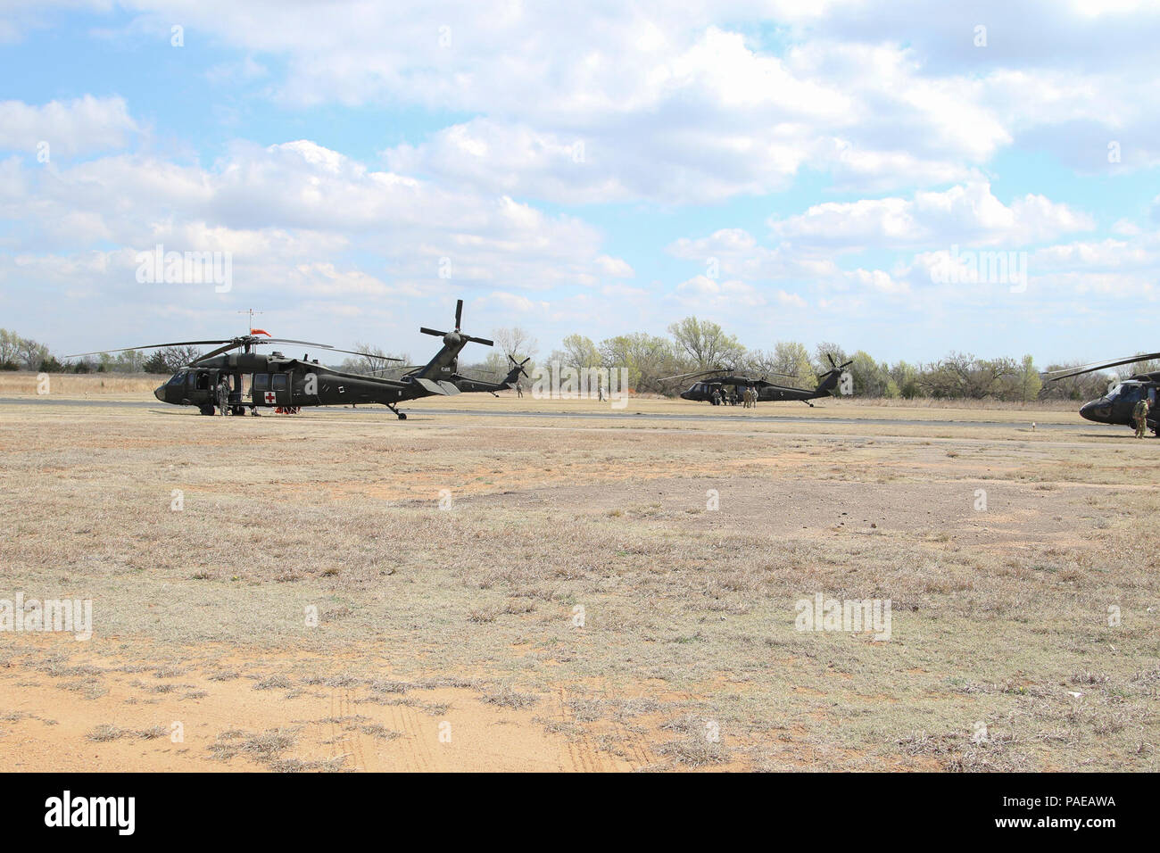 Four UH-60 Black Hawk helicopters piloted and crewed by Soldiers with ...