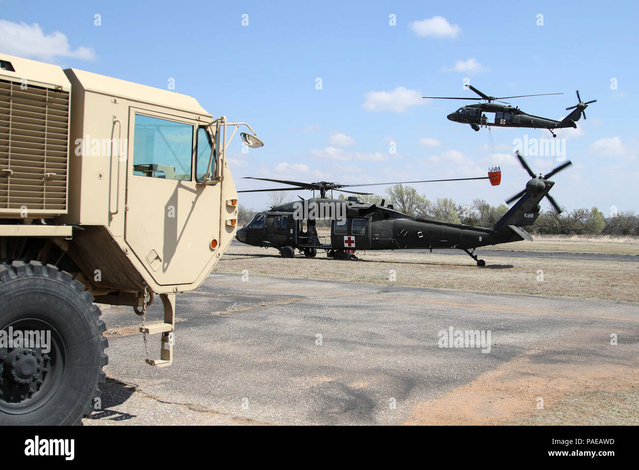 Four UH-60 Black Hawk helicopters piloted and crewed by Soldiers with ...