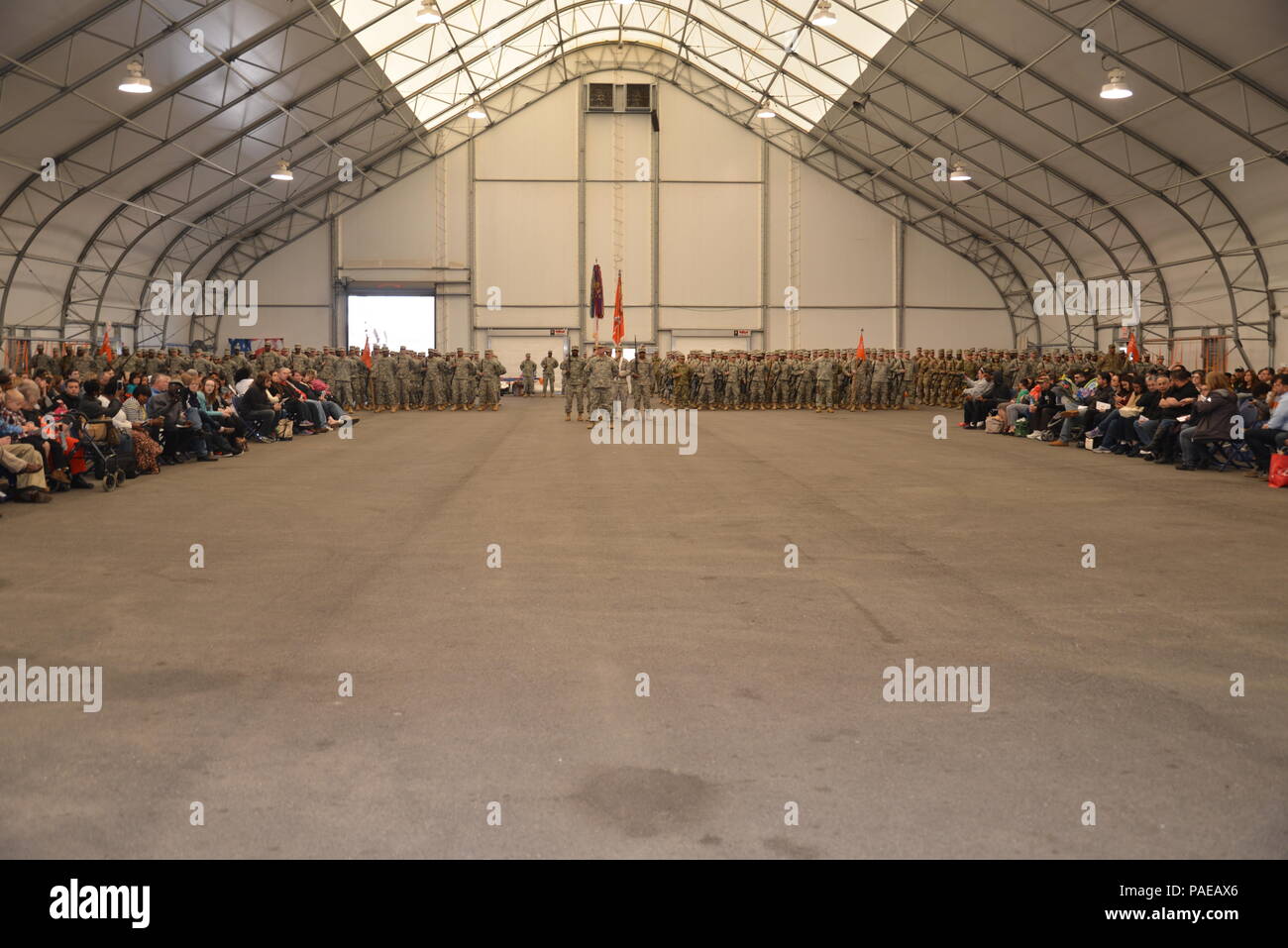The 392nd ESB stands in formation in front of over 500 family members ...