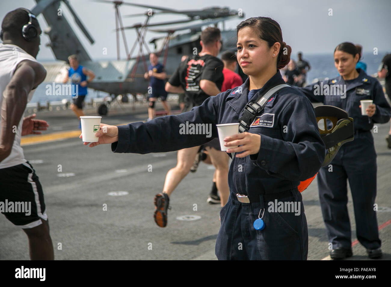 At sea. (March 27, 2016)-U.S. Sailor HM2 Charissa Caayao, with the 13th ...