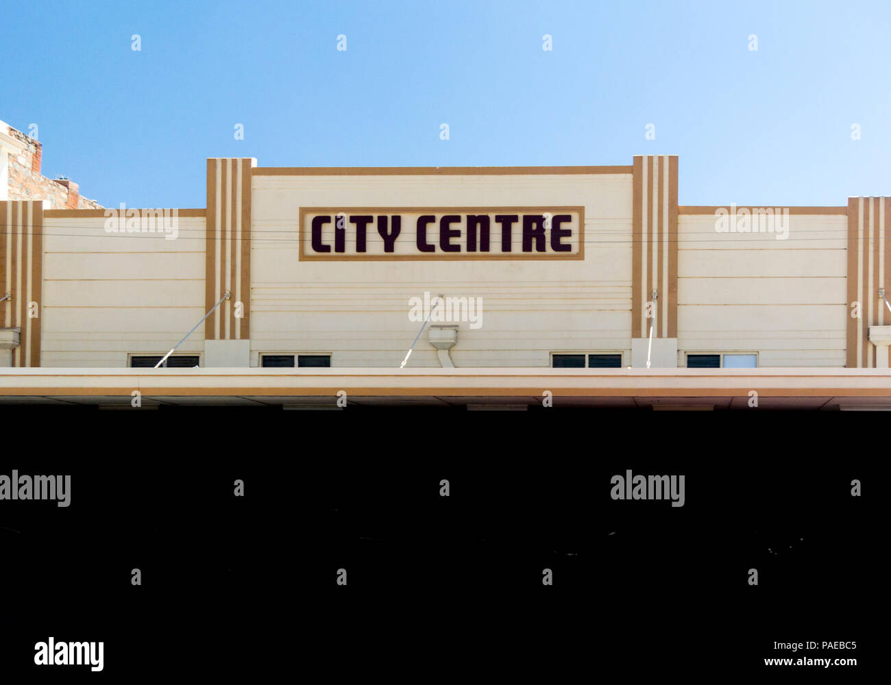 A City Centre sign on the facade of a shop Stock Photo - Alamy