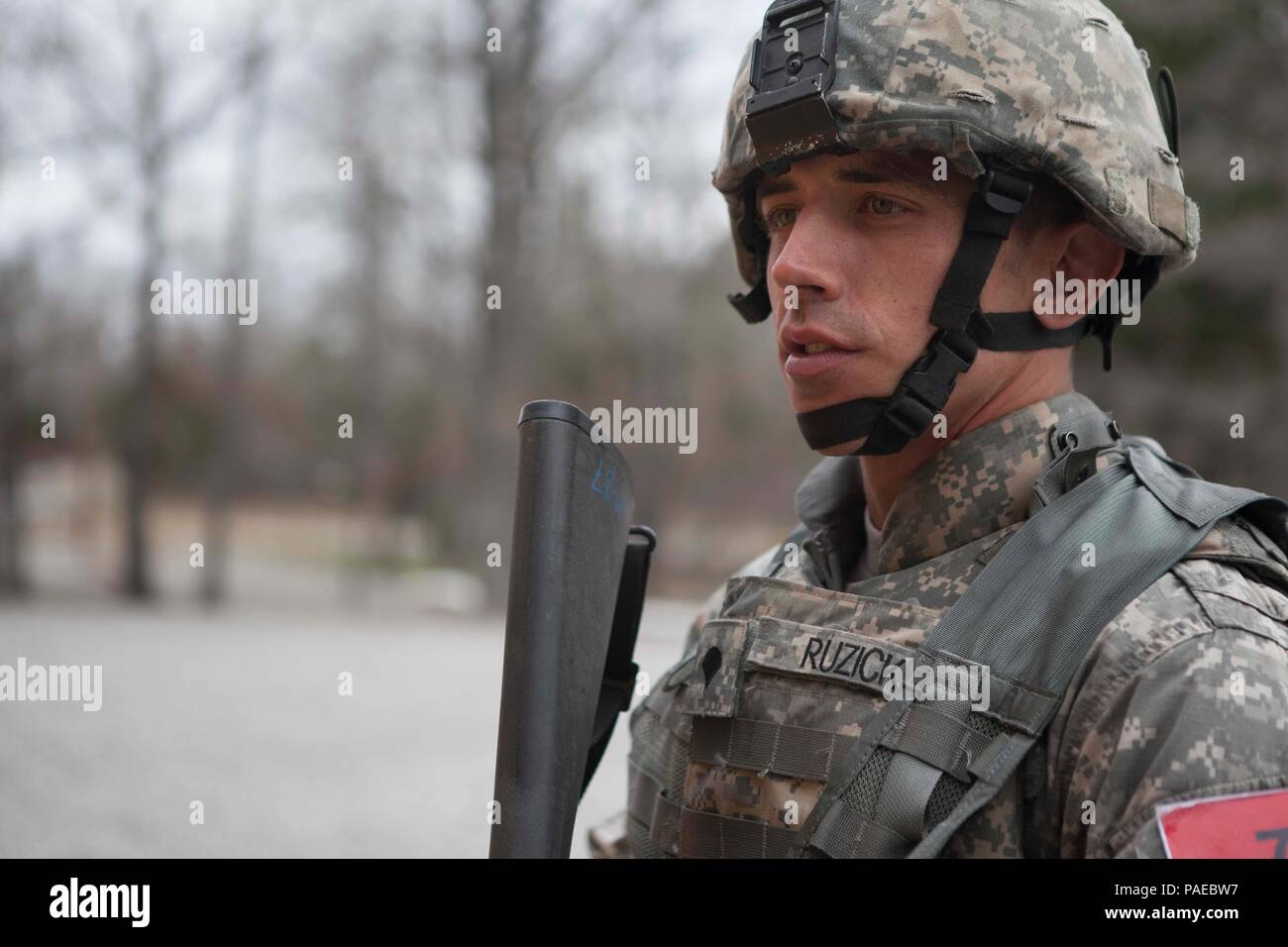 U.S. Army Spc. Justin Ruzicka with the 11th Aviation Command receives ...
