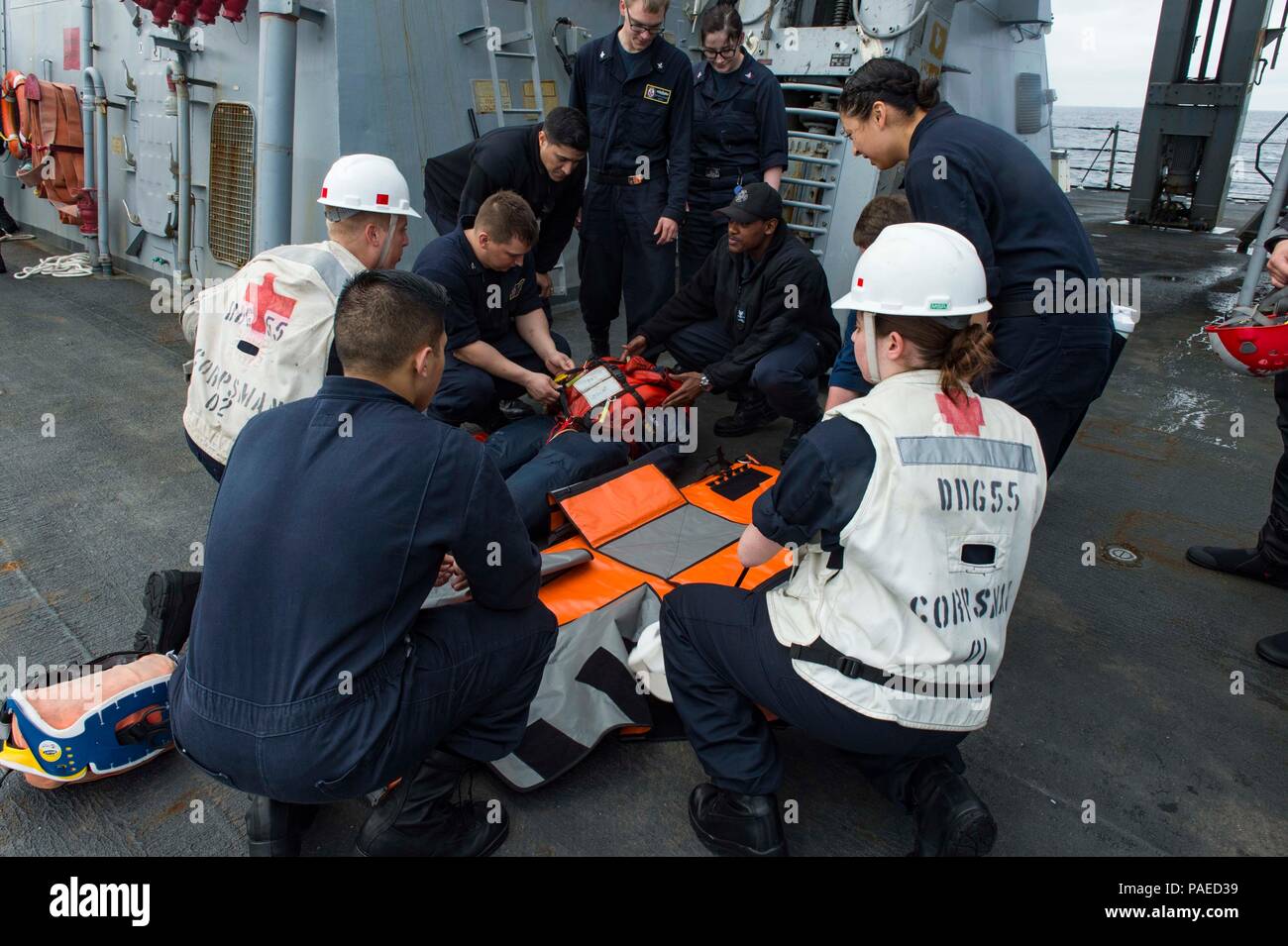 Sailors aboard USS Stout (DDG 55) conduct stretcher-bearer training ...