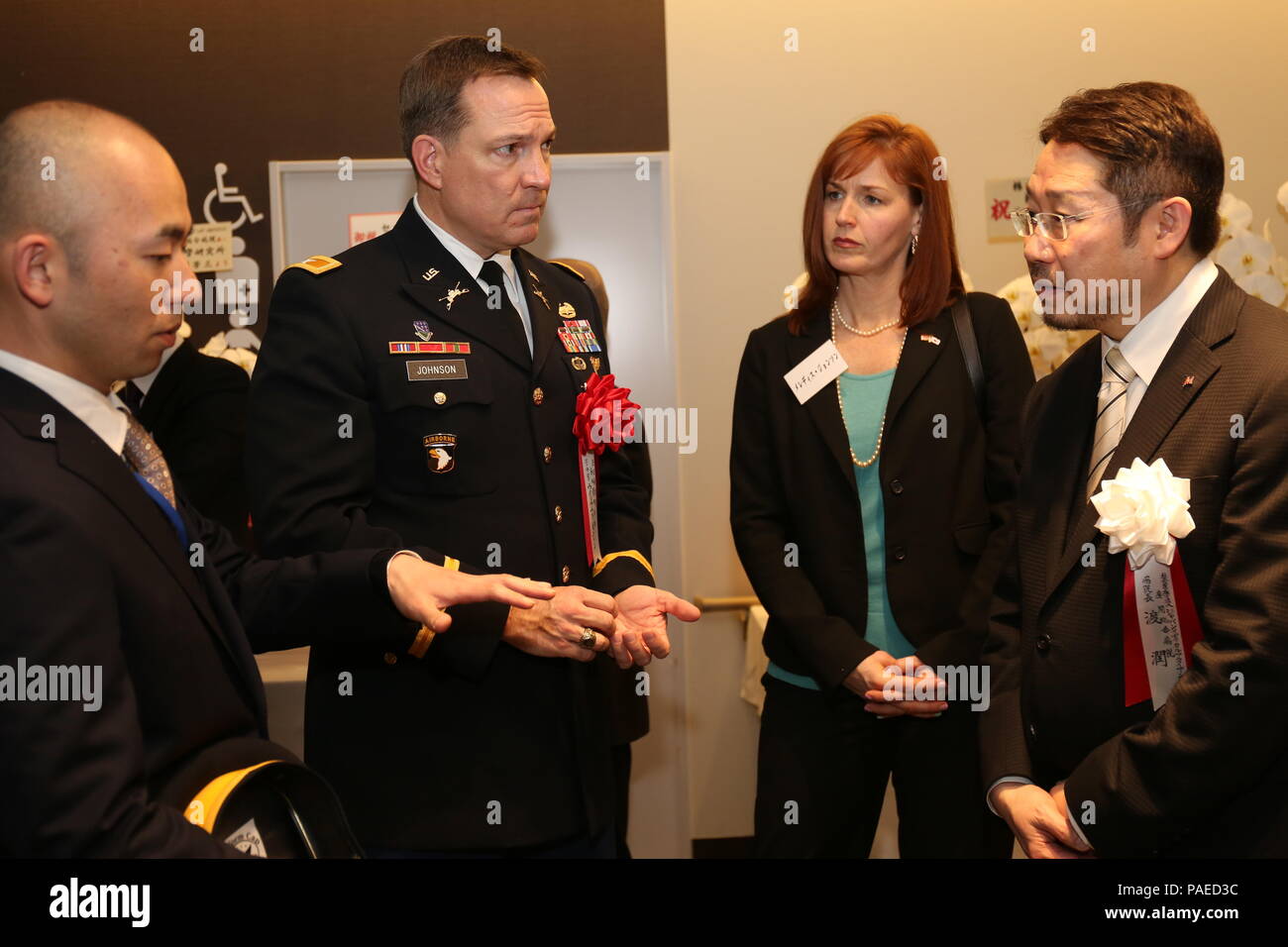 Col. William B. Johnson, commander of USAG Japan, asks Jun Watari ...