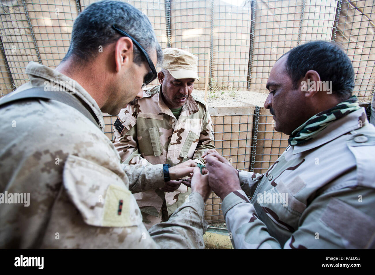 U.S. Marine Chief Warrant Officer 4 Brian Branch, left, the explosive ...