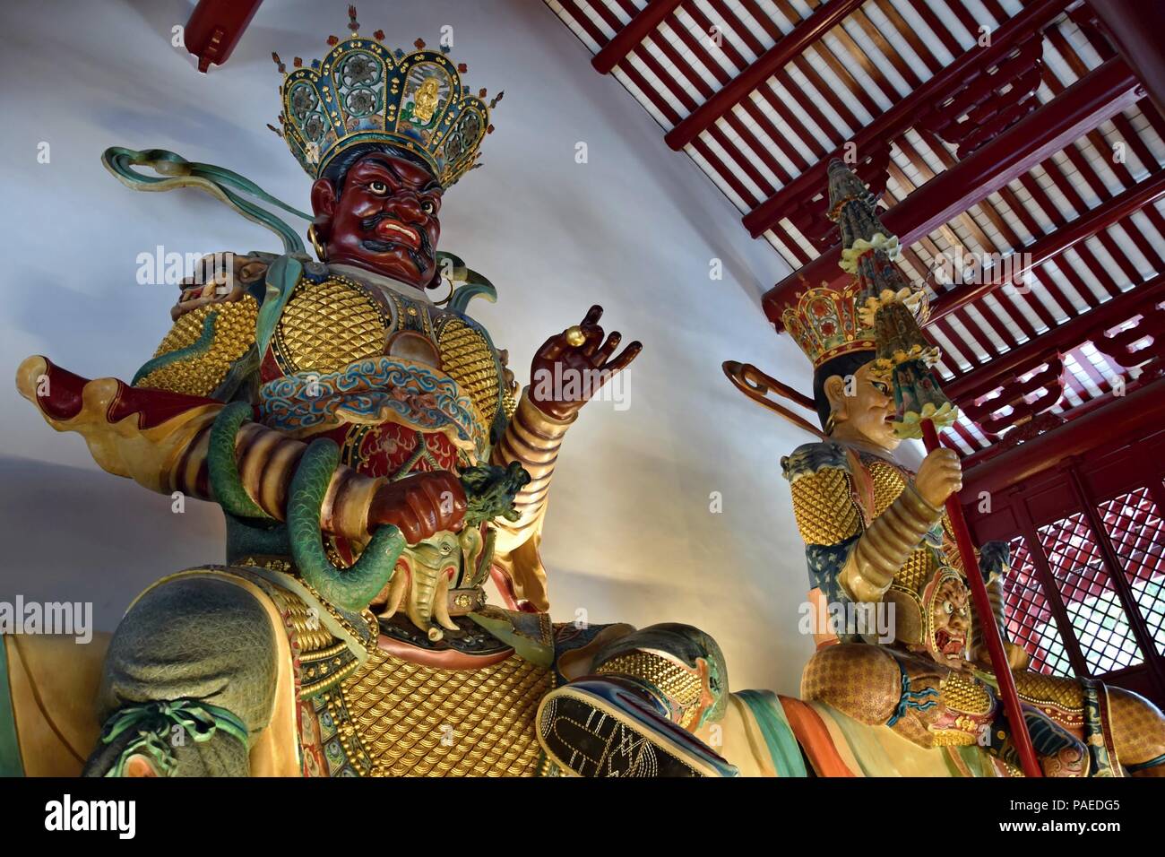 Buddhist guardian statue inside a Chinese temple Stock Photo - Alamy