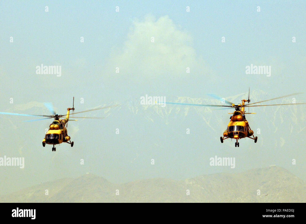 KABUL, Afghanistan -- A collection of Mi-17's and Mi-35 helicopters and ...