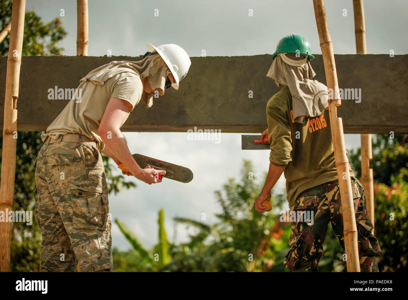 U.S. Air Force Airman 1st Class Ben Setchell, left, engineer, assigned ...
