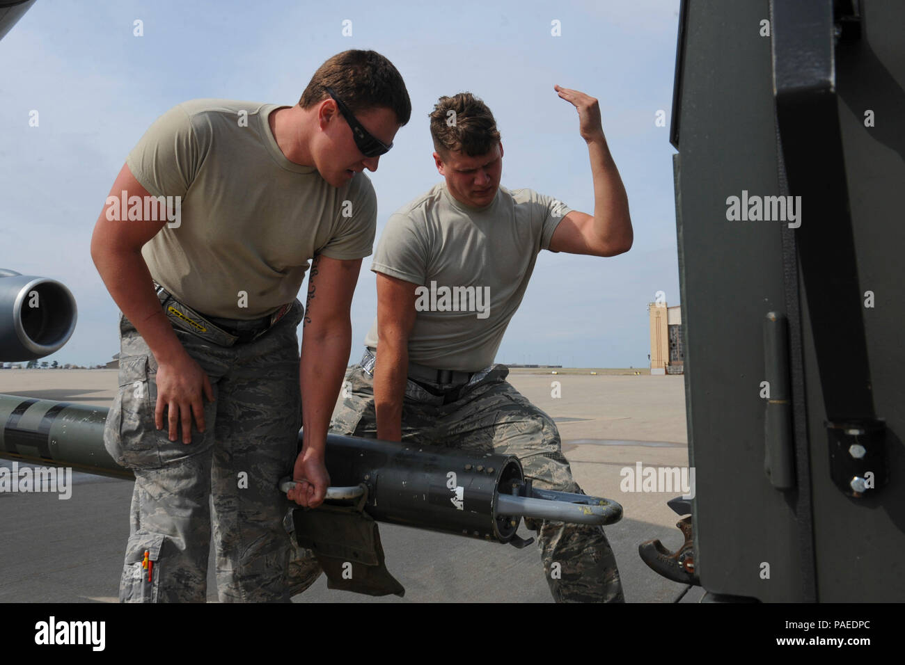 Airman 1st Class Garrett Jornov, left, and Staff Sgt. Austin Weber ...