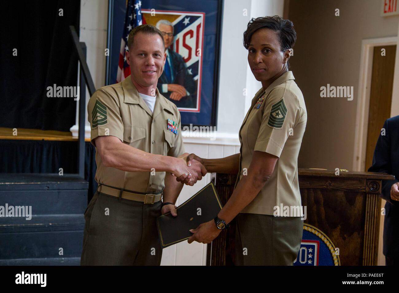 U.S. Marine Corps Gunnery Sgt. James Hill, left, an instructor with ...