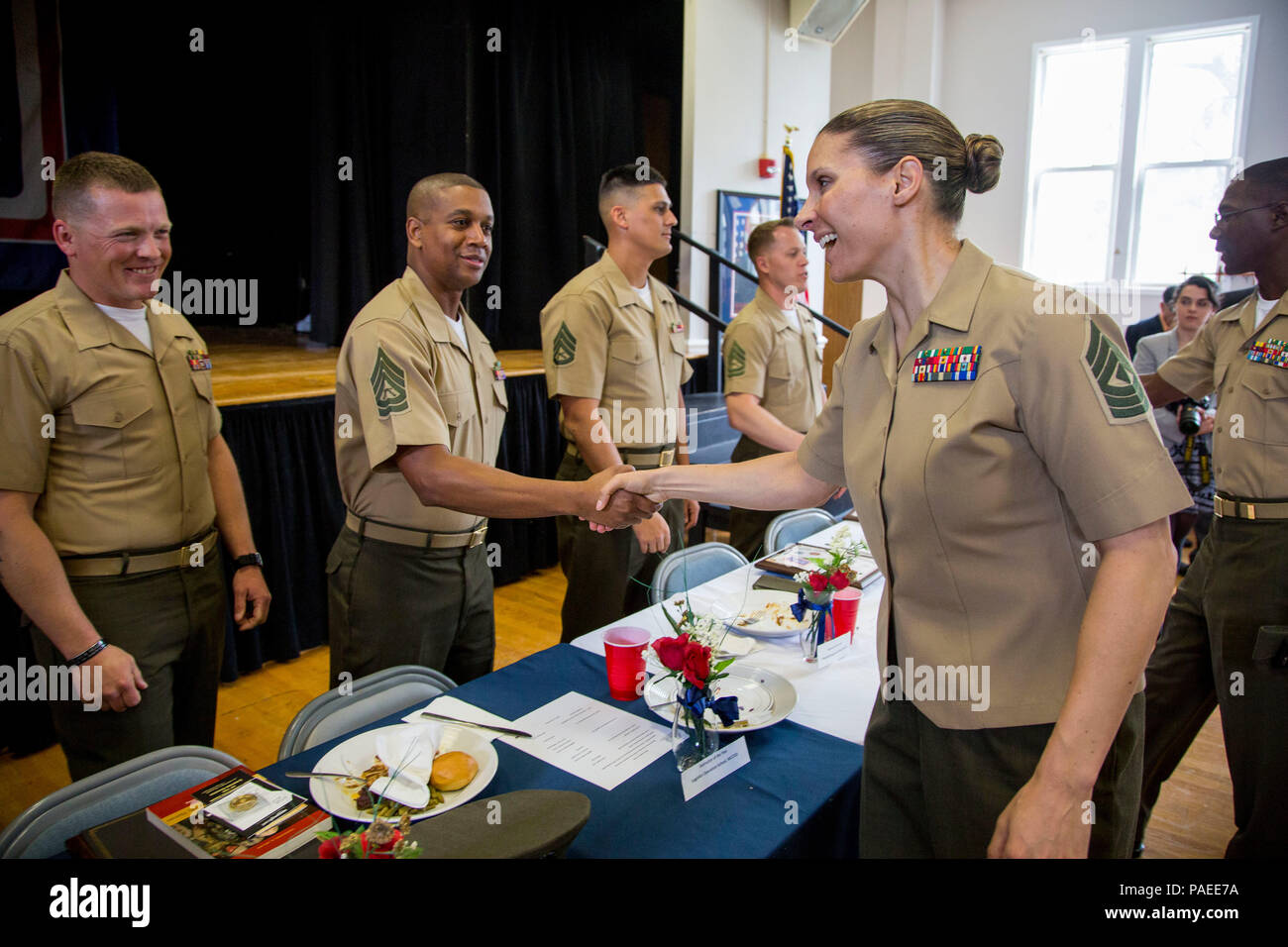 U.S. Marine Corps 1st Sgt. Tina Dexter, right, school first sergeant ...