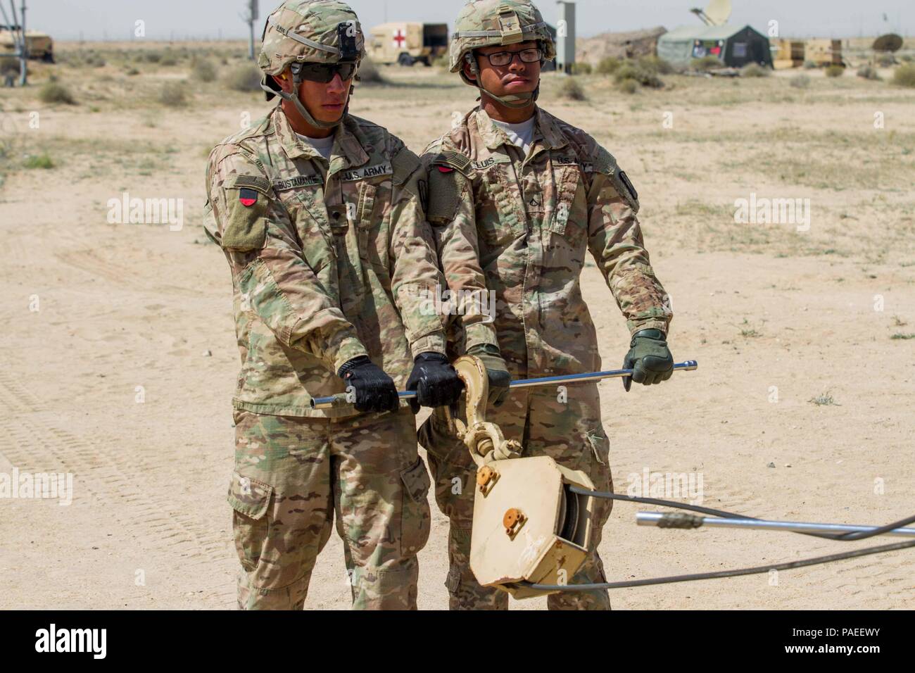 Members of a reload team from Battery A, 4th Battalion, 3rd Air Defense ...
