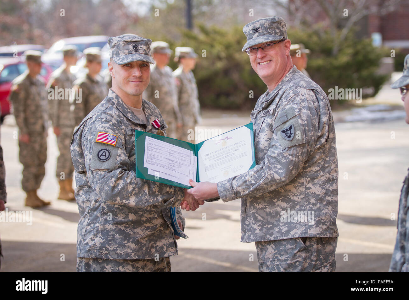 U.S. Army 1st Sgt. Jeremy D. Parish is awarded the Meritorious Service ...