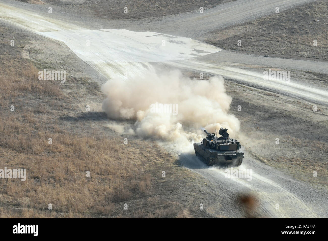 A M1A2 Abrams main battle tank crew from Company D, 2nd Battalion, 5th ...