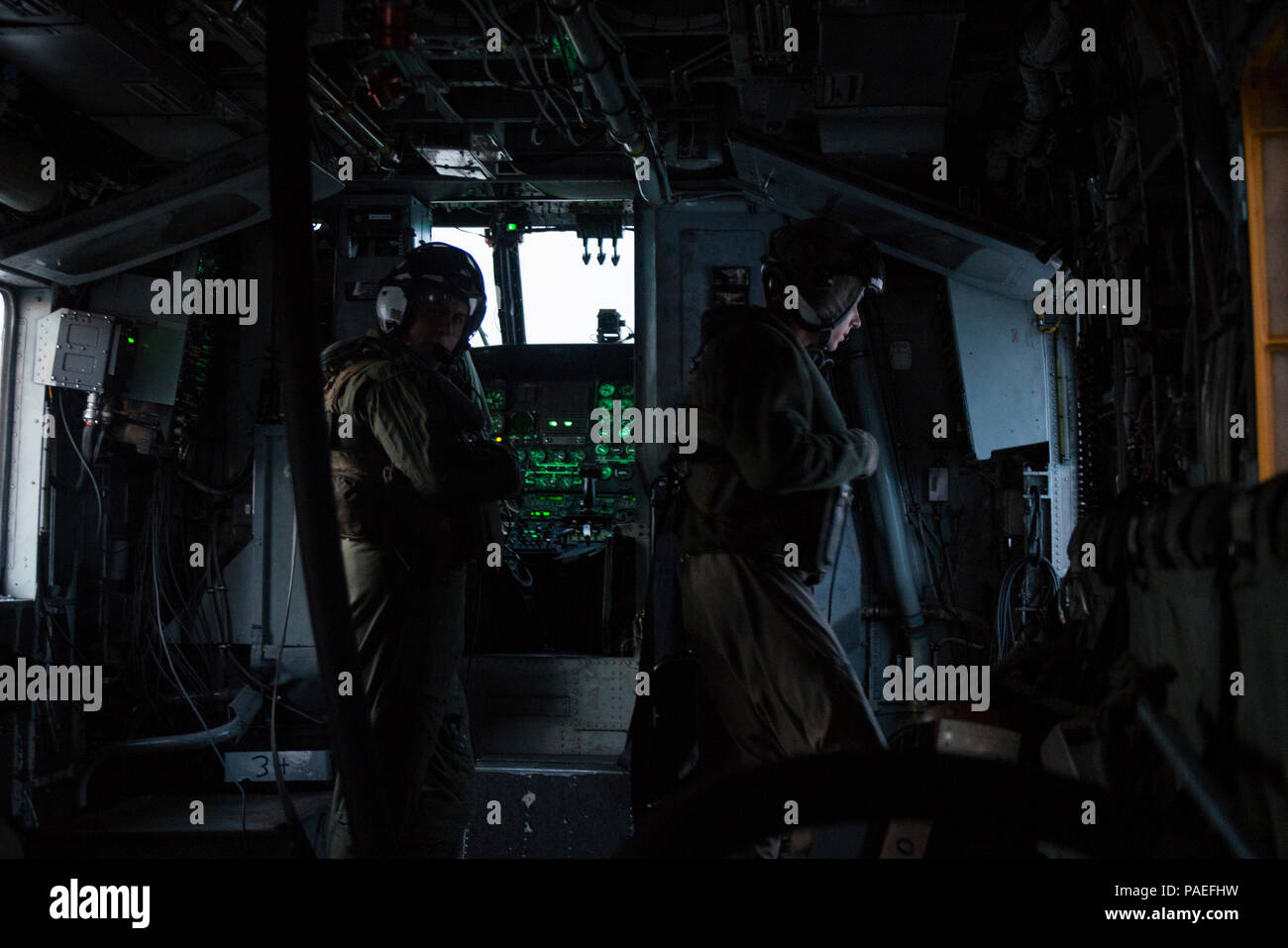 Crew chiefs from Marine Heavy Helicopter Squadron 772 prepare for a ...