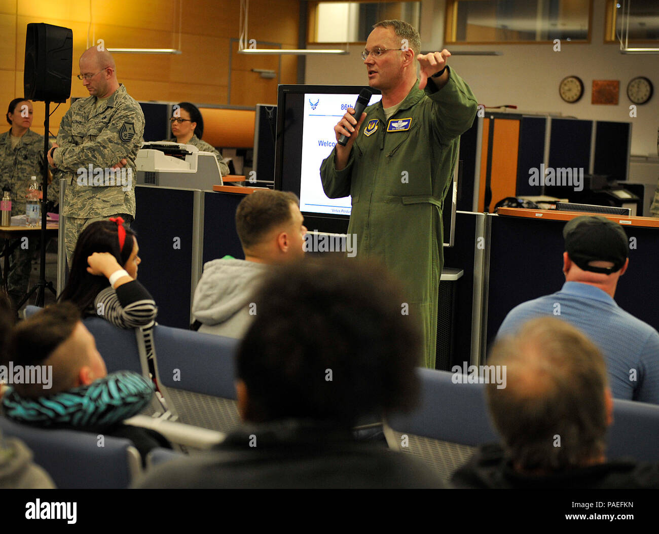 Brig. Gen. Jon T. Thomas, 86th Airlift Wing commander, talks to ...