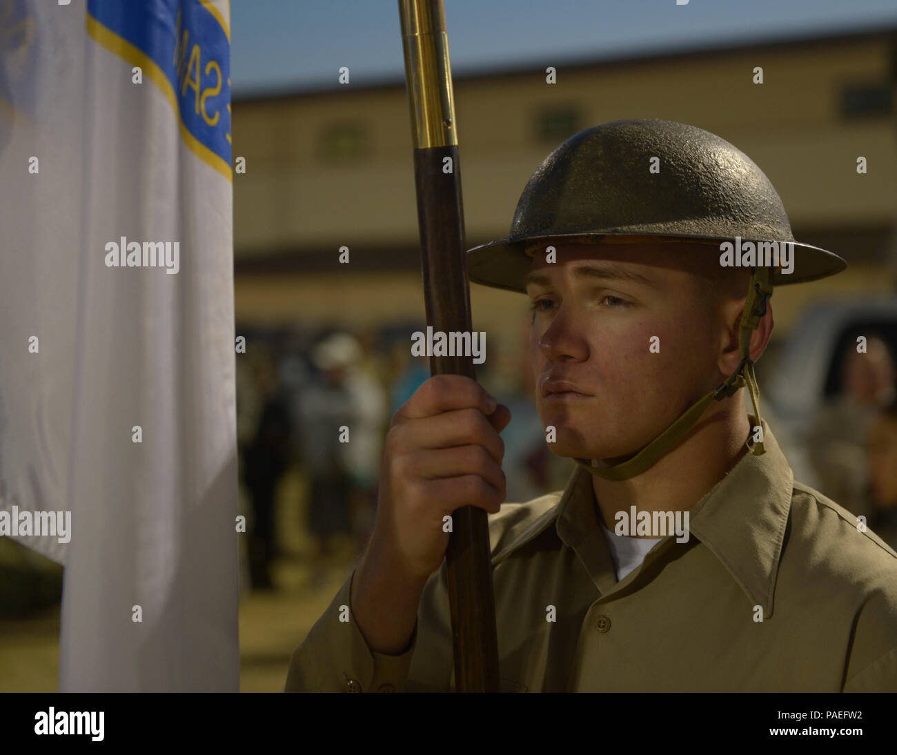 A New Mexico ROTC student holds a Battling Bastards of Bataan flag at ...