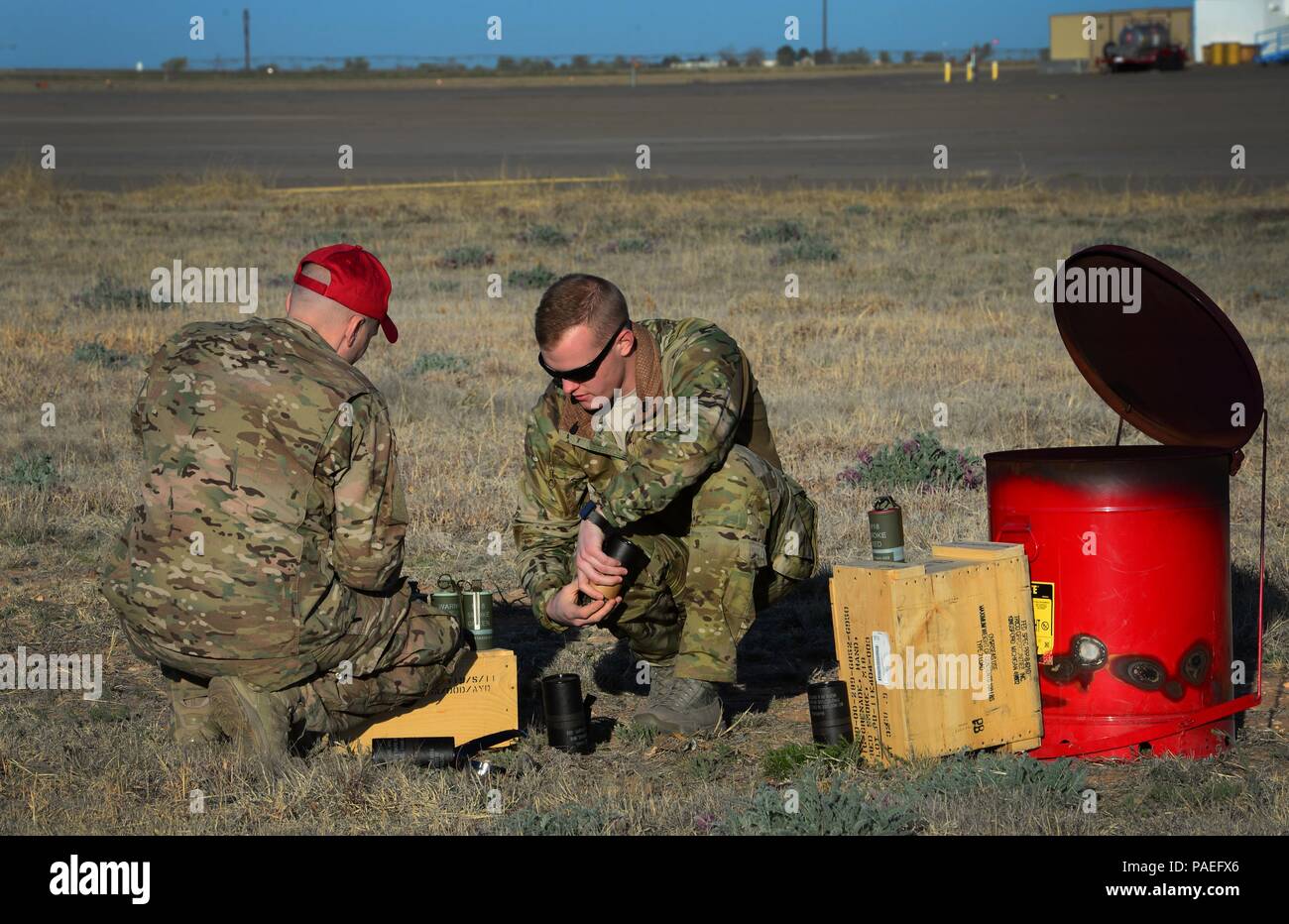 Team members with the 26th Special Tactics Squadron prepare a smoke ...