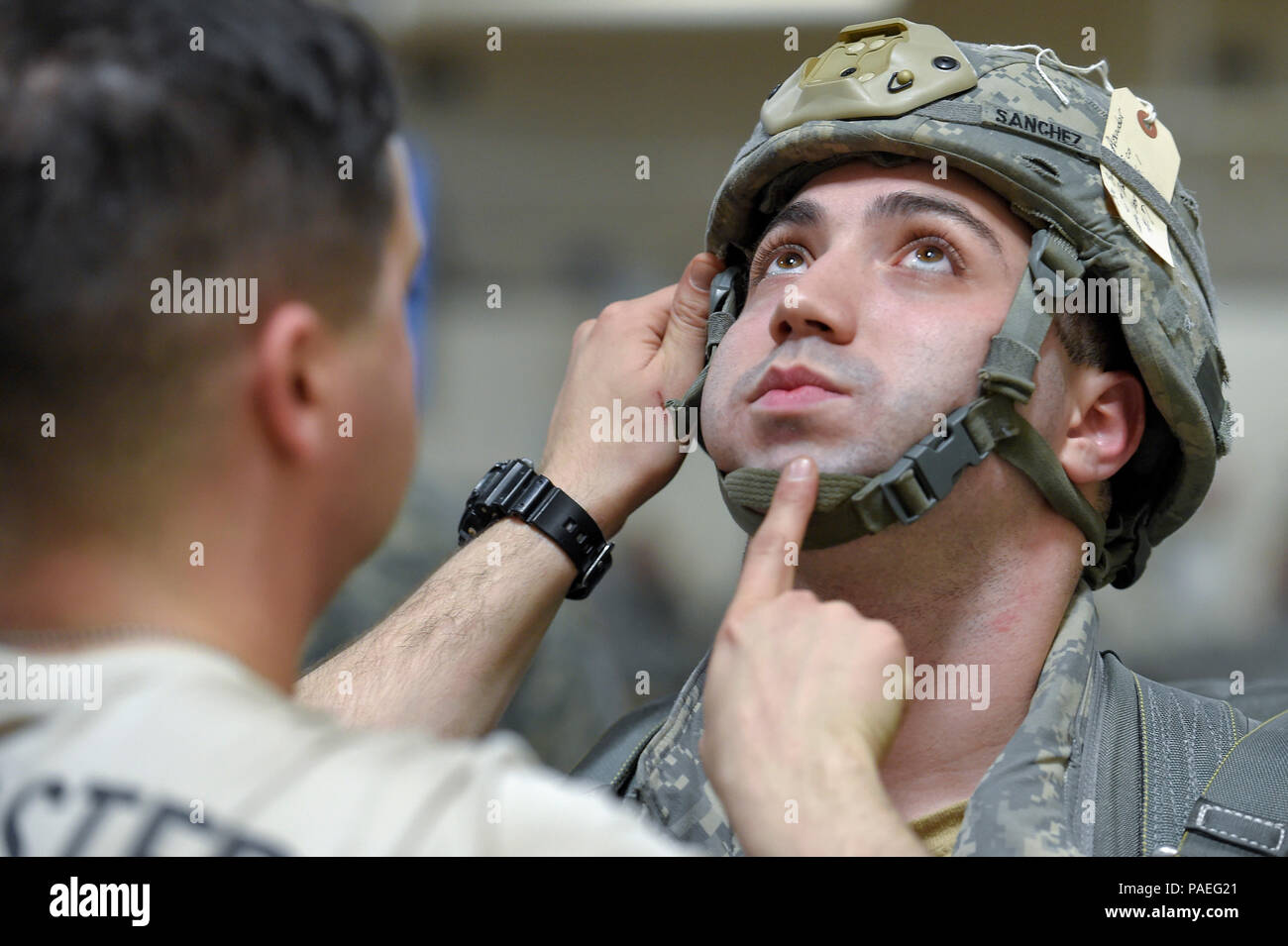 U.S. Army Staff Sgt. James Martell, left, a jumpmaster assigned to the ...